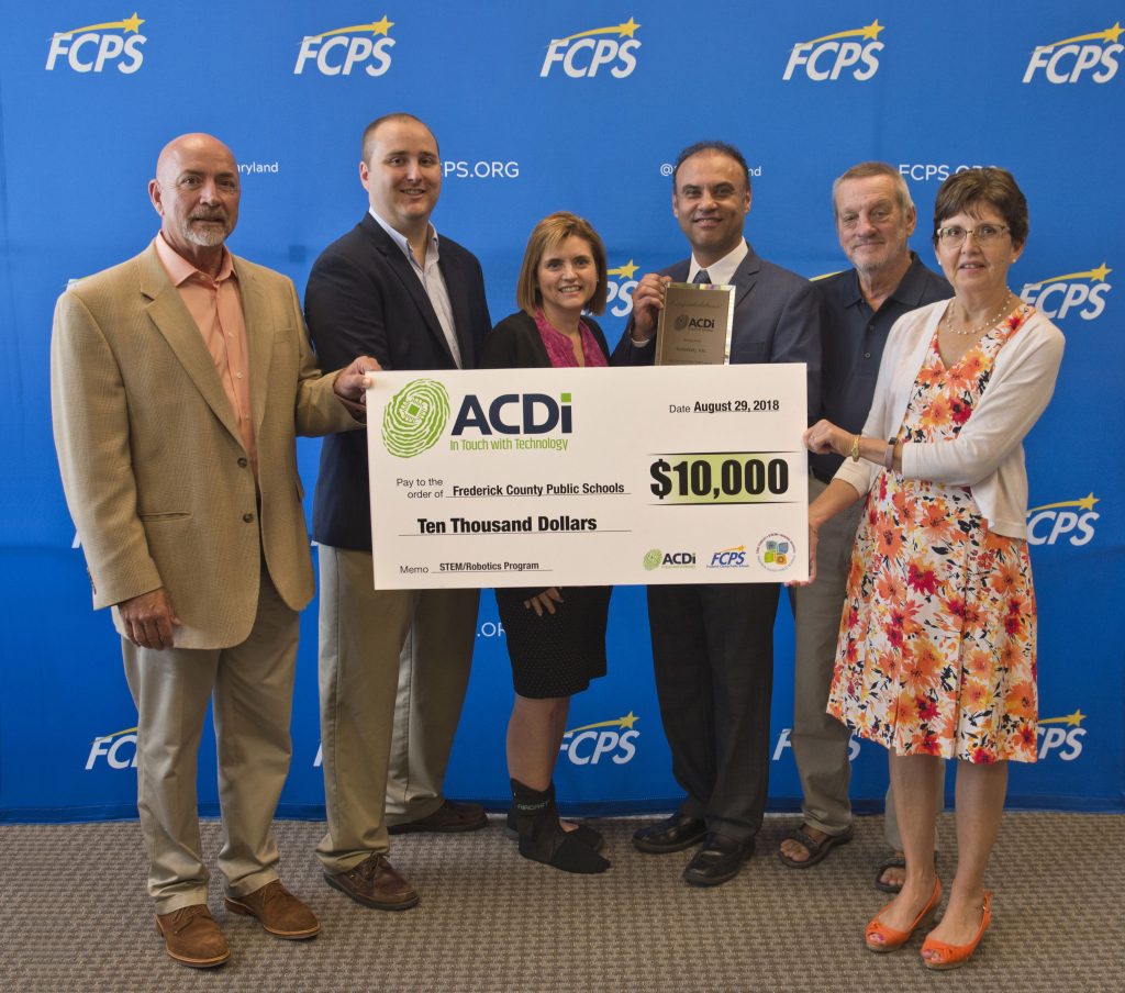ACDi Celebrates Milestone with $10,000 FCPS Donation - ACDI